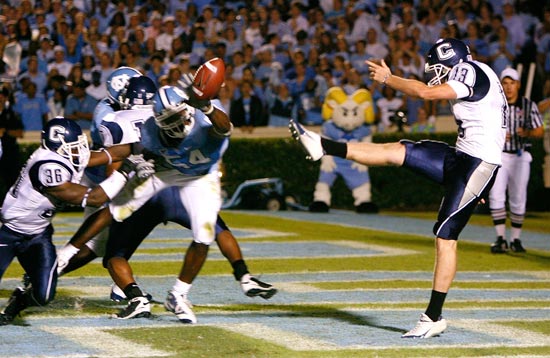 Photo: Bruce Carter Blocks UConn Punt - Tar Heel Times